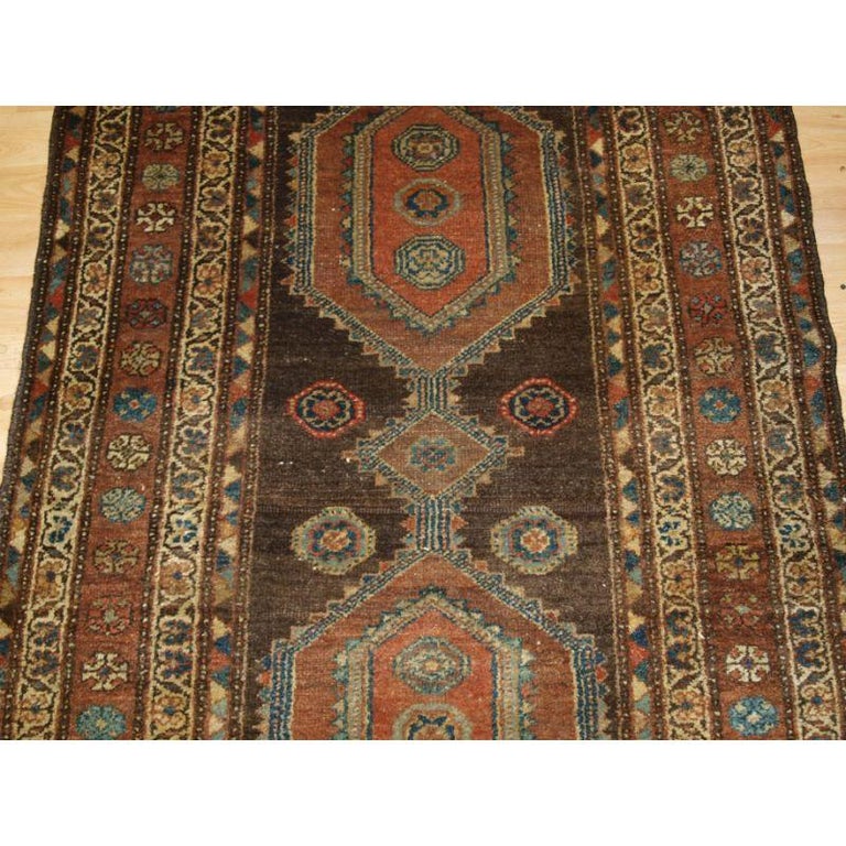 Antique Kurdish Long Rug with Linked Medallion Design For Sale at 1stDibs
