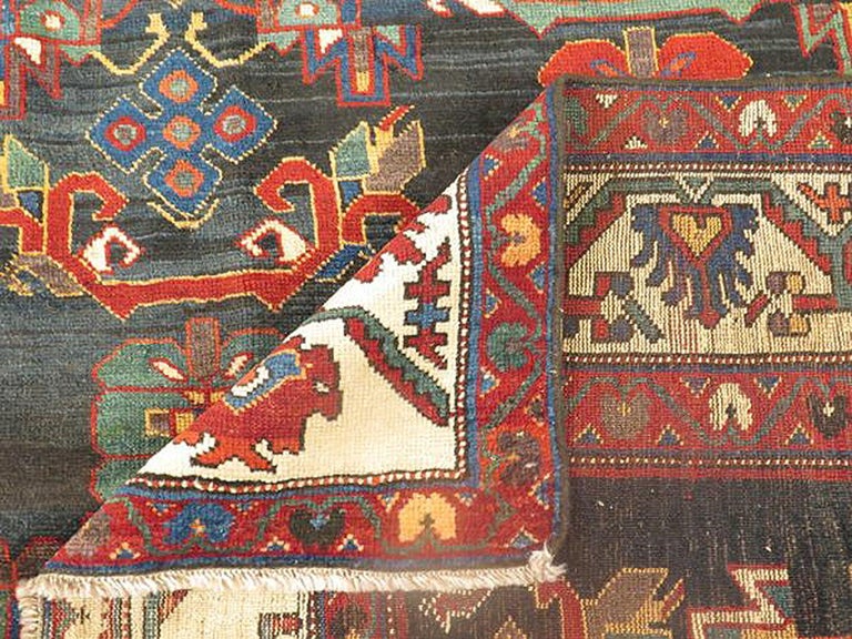 Antique Persian Bakhtiar Rug with Green and Red Flower Details on Black ...