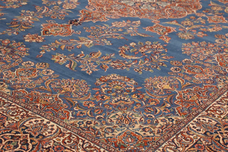 Antique Persian Ghazvin Rug with Flower Medallion over a Blue Field ...