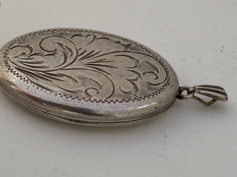 Antique Silver Engraved Oval Locket Pendant For Sale at 1stDibs