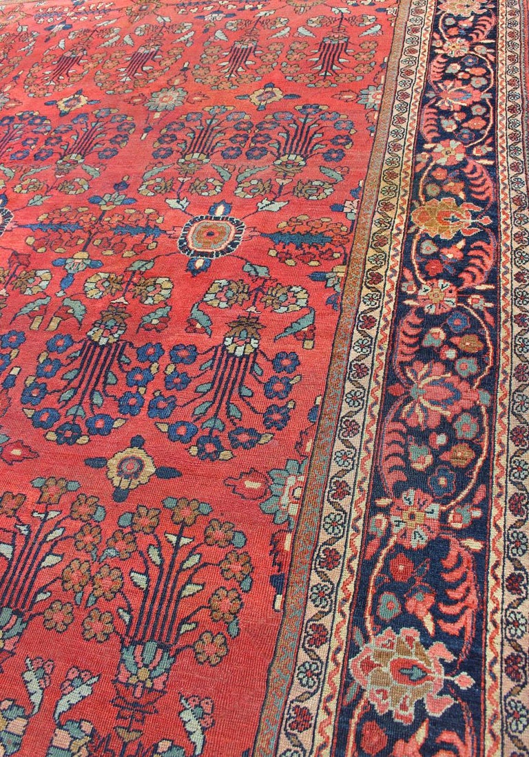 Antique Sultanabad Carpet with Large Scale Flowers Set Atop a Red Field ...