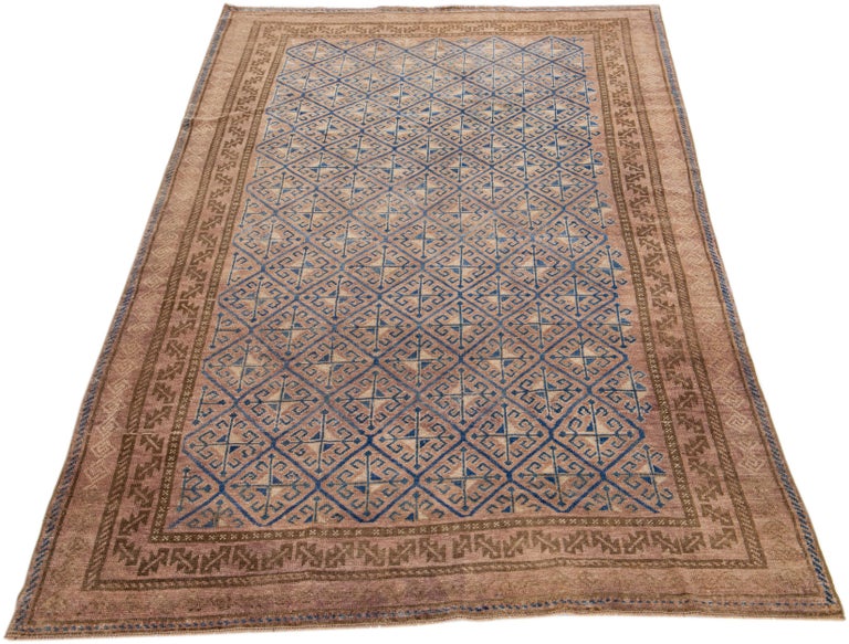 Antique Turkmen Brown Handmade Persian Wool Rug with Gul Design For ...