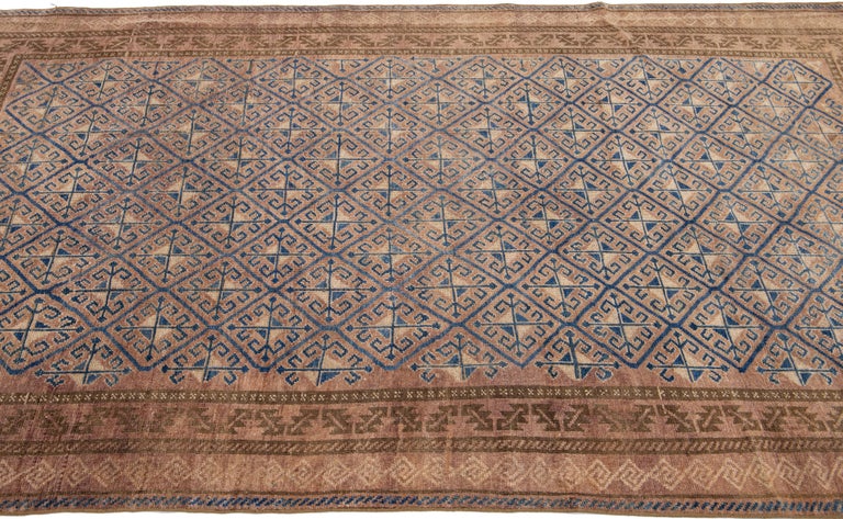 Antique Turkmen Brown Handmade Persian Wool Rug with Gul Design For ...