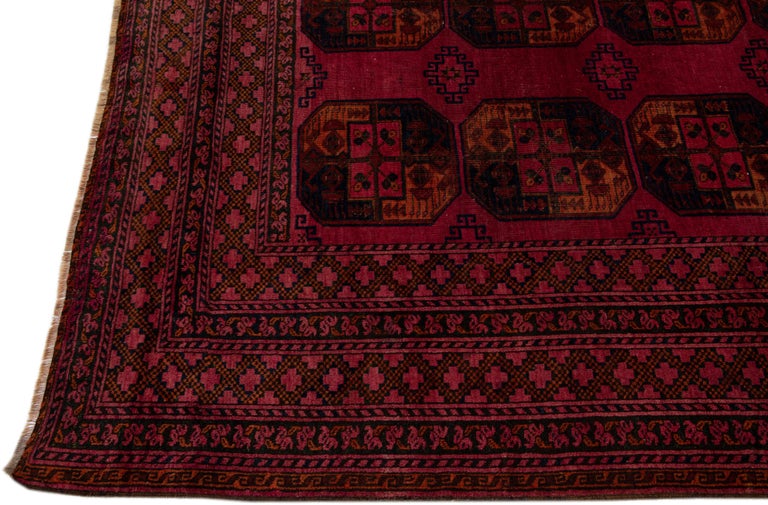 Antique Turkmen Handmade Red Oversize Wool Rug with Gul Motif For Sale ...