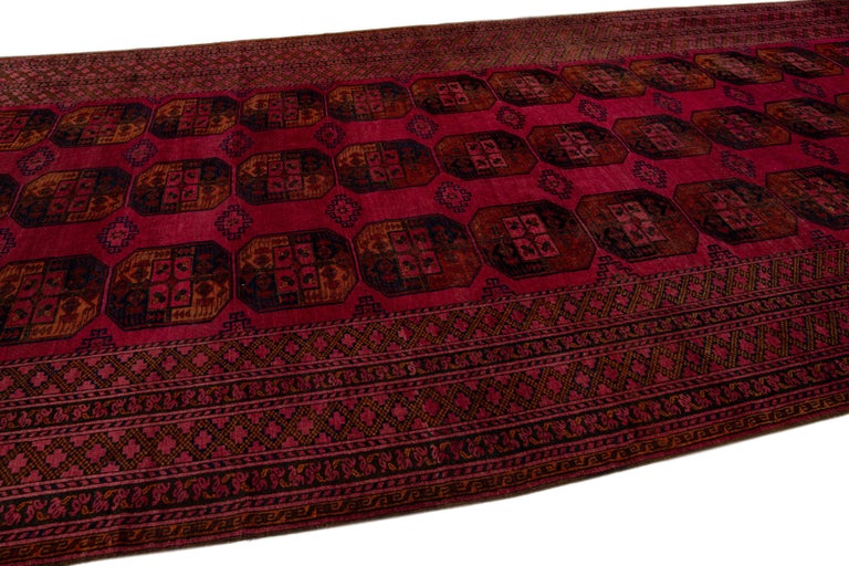Antique Turkmen Handmade Red Oversize Wool Rug with Gul Motif For Sale ...