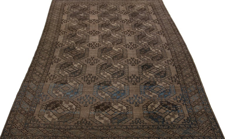 Antique Turkmen Handmade Wool Brown Rug with Gul Design For Sale at 1stDibs