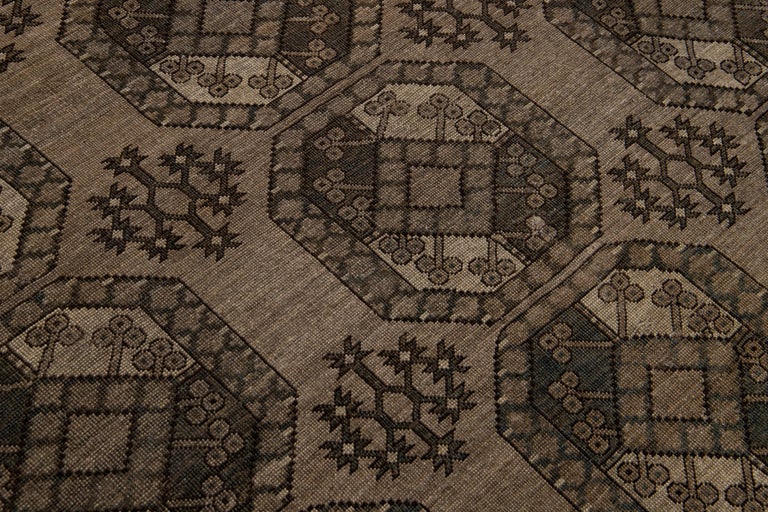 Antique Turkmen Handmade Wool Brown Rug with Gul Design For Sale at 1stDibs