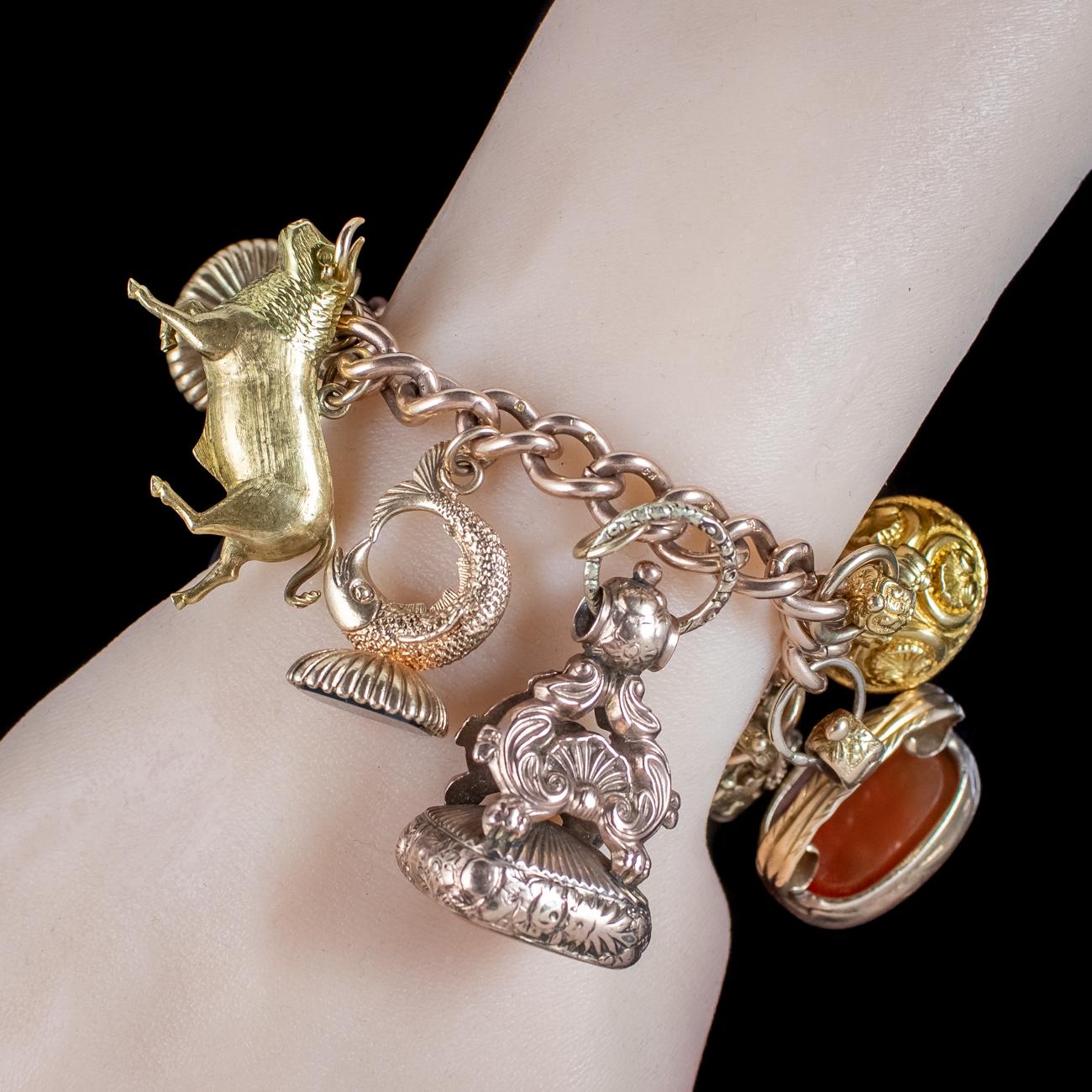 Antique Victorian Charm Bracelet With 12 Charms And Fobs For Sale at ...