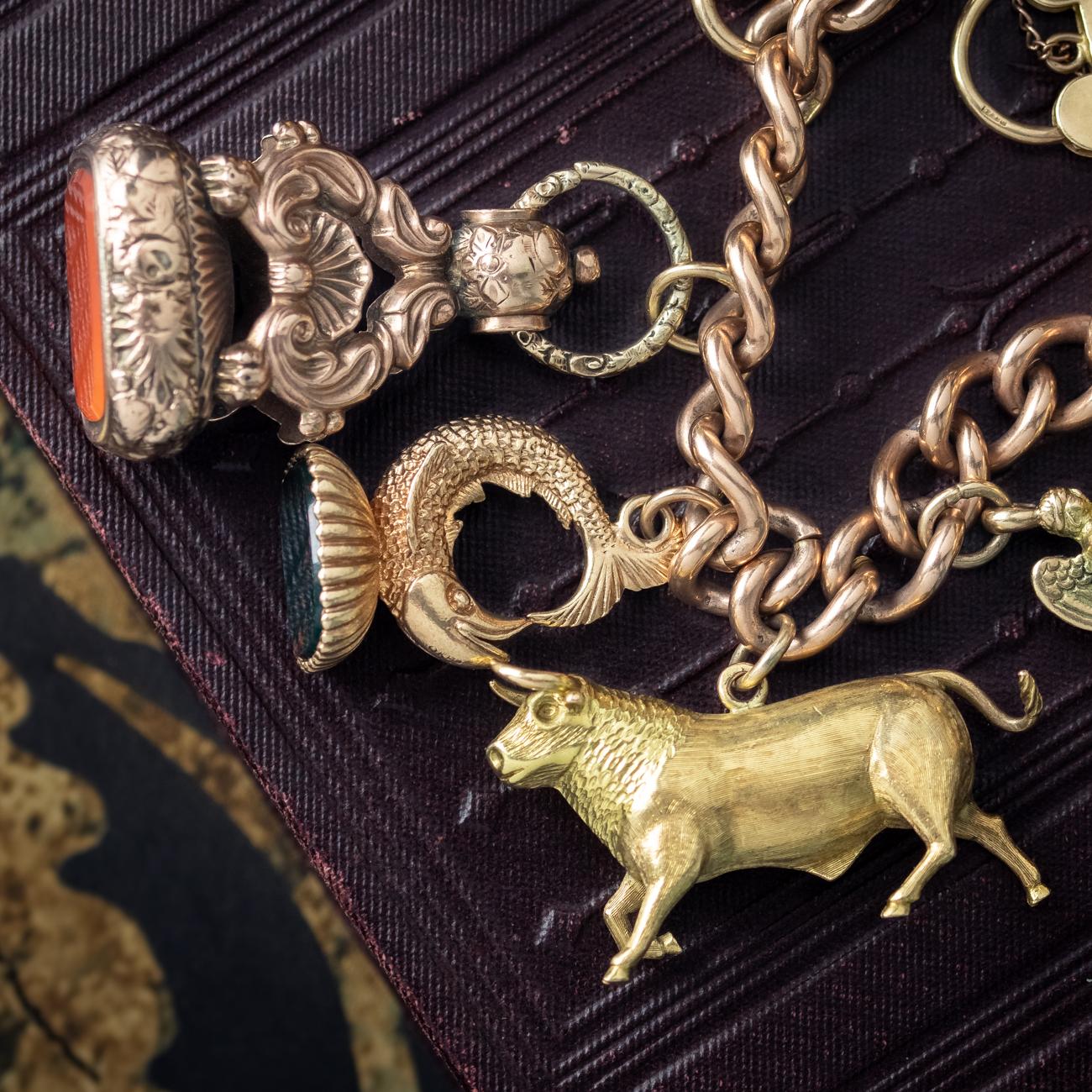 Antique Victorian Charm Bracelet With 12 Charms And Fobs For Sale at ...