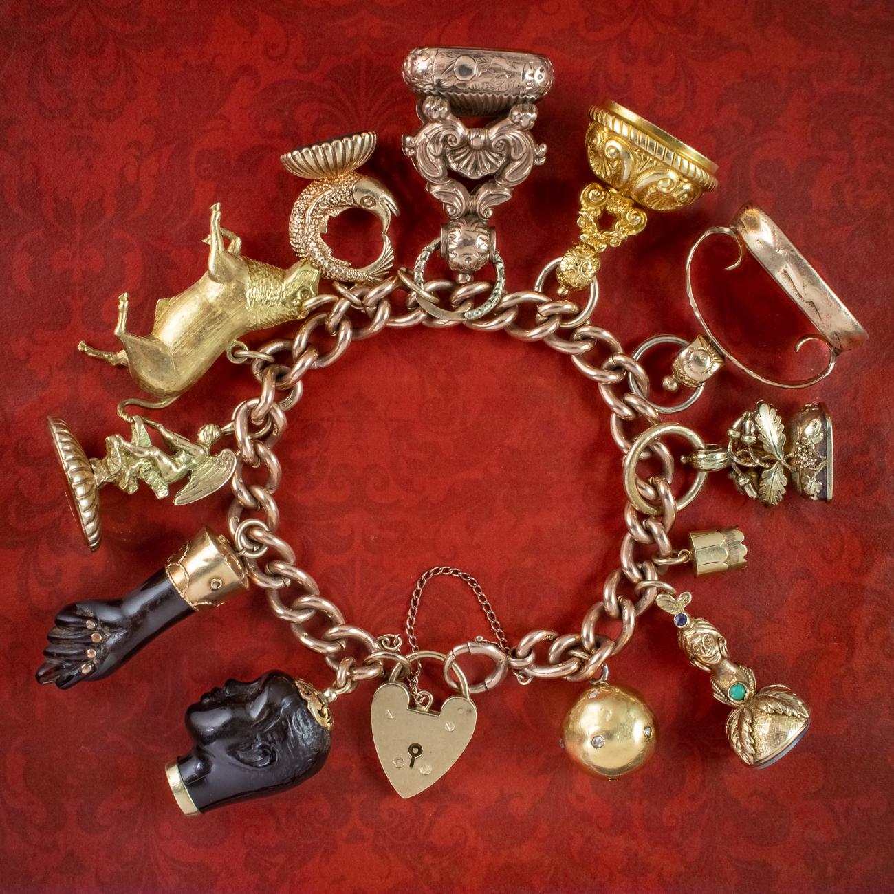 Antique Victorian Charm Bracelet With 12 Charms And Fobs For Sale at ...
