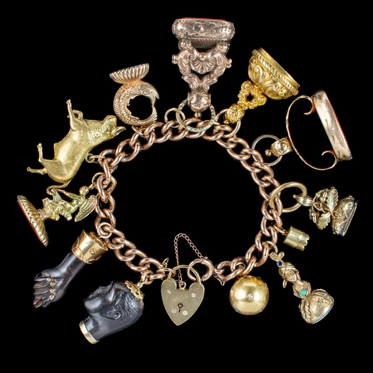 Antique Victorian Charm Bracelet With 12 Charms And Fobs For Sale at ...