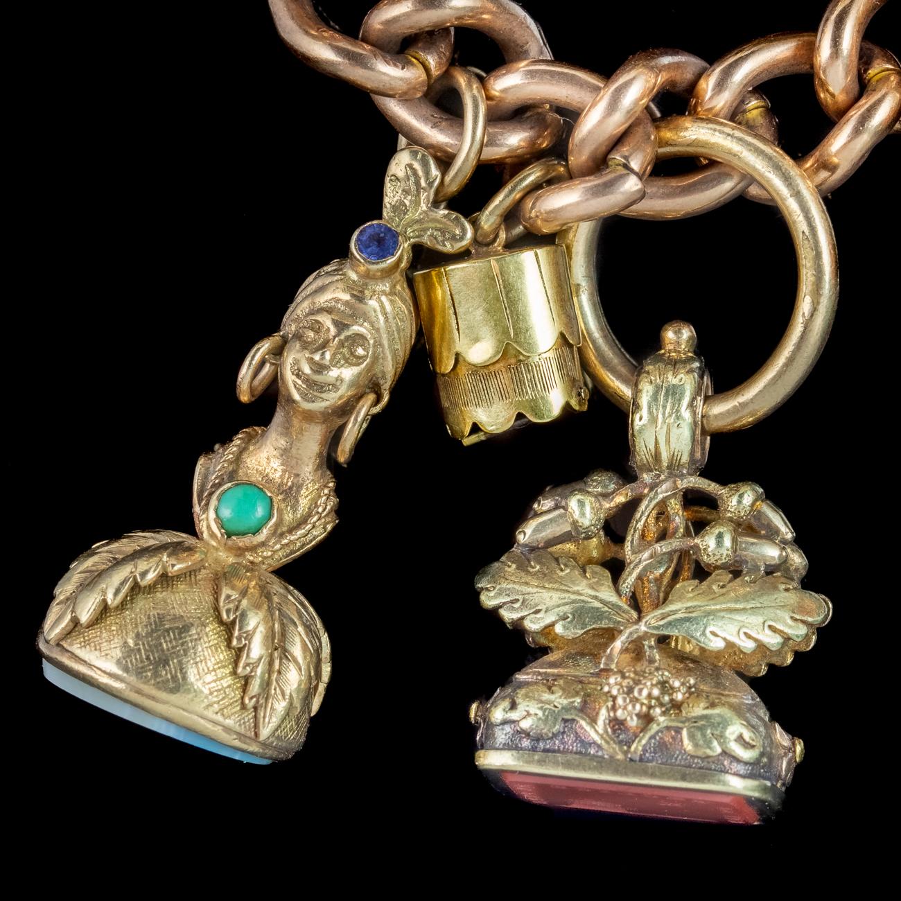 Antique Victorian Charm Bracelet With 12 Charms And Fobs For Sale at ...