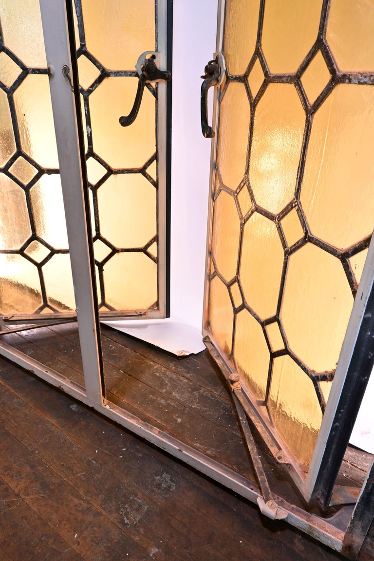 Arched Iron Framed French Window with Yellow Glass For Sale at 1stDibs