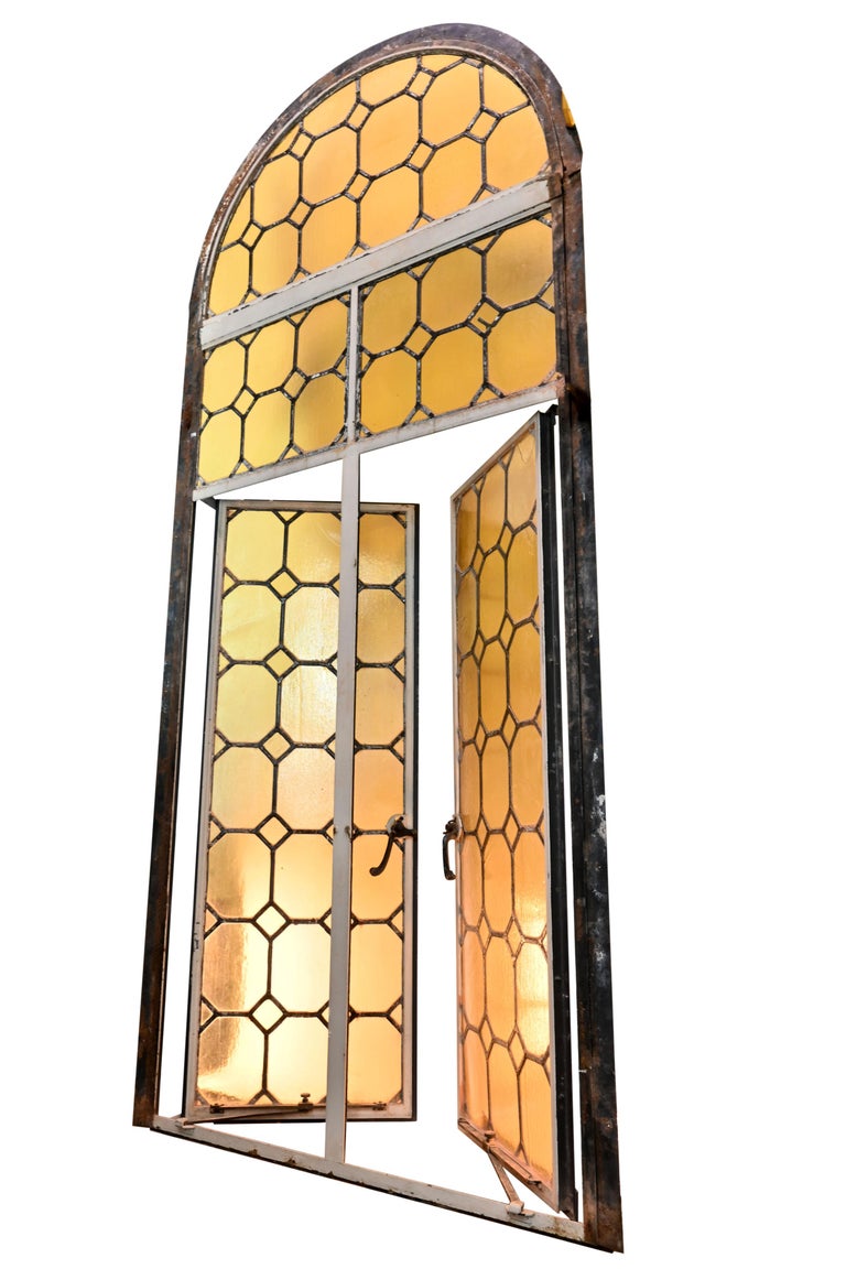 Arched Iron Framed French Window with Yellow Glass For Sale at 1stDibs