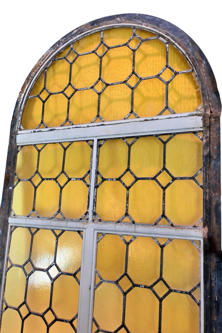 Arched Iron Framed French Window with Yellow Glass For Sale at 1stDibs