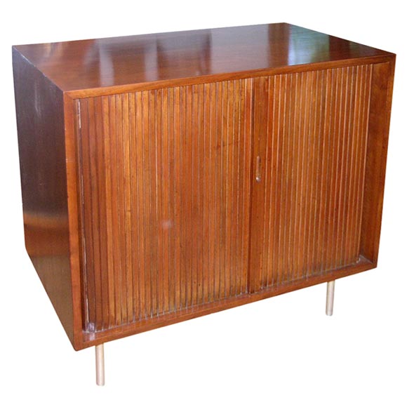 Pair of Roll Front Cabinets at 1stDibs