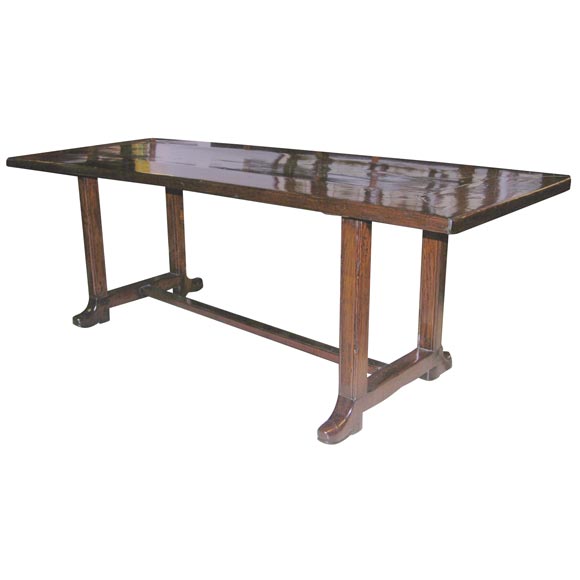Spanish Colonial harvest table with carved boot legs at 1stDibs
