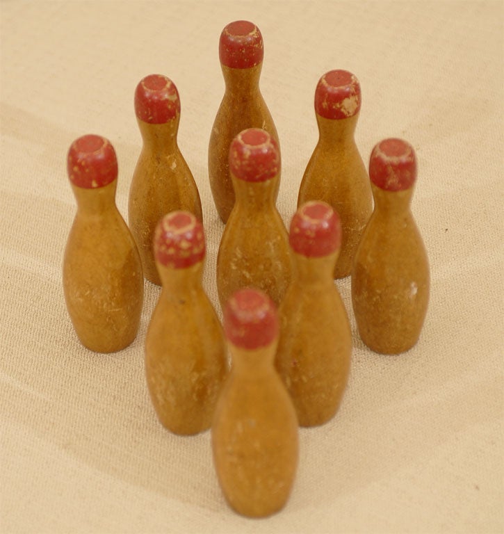 Set of Nine Miniature Bowling Pins with Red Tops at 1stDibs
