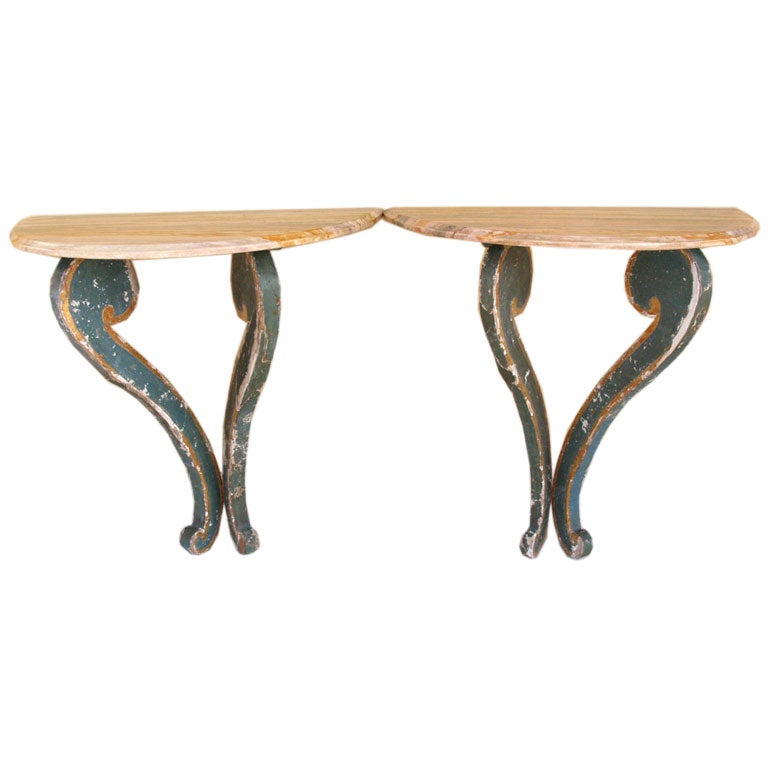 Pair of demi-lune, wall mounted console tables at 1stDibs