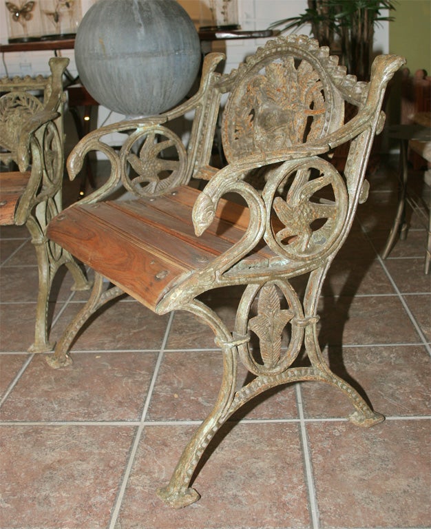 DECORATIVE CAST IRON GARDEN SEATING SET at 1stDibs