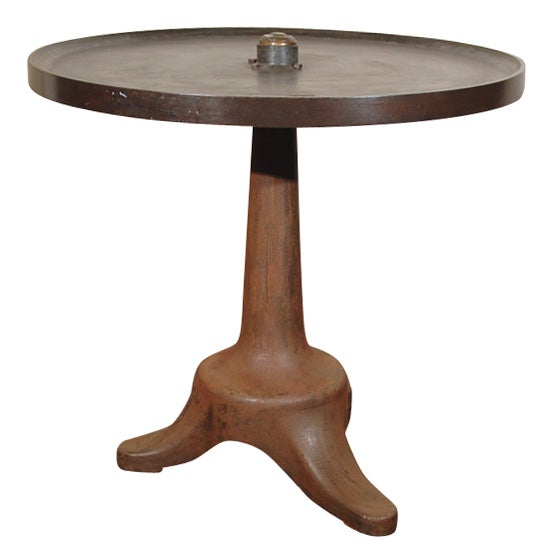 Cast iron round table at 1stDibs