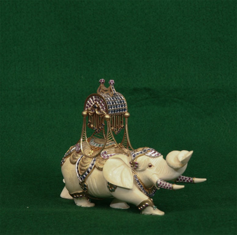 AN IVORY BEJEWELLED FIGURE OF AN ELEPHANT. EARLY 20th CENTURY at 1stDibs