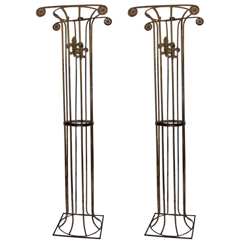 Monumental Pair of large scale iron columns/plant stands. at 1stDibs