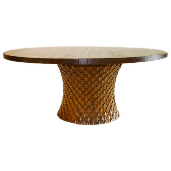A BALINESE STYLE CIRCULAR PEDESTAL DINING TABLE For Sale at 1stDibs