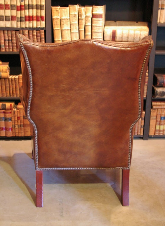 Impressive Distressed Leather Wing Back Chair at 1stDibs