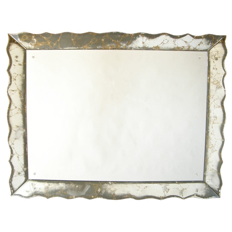 Monumental wall mirror with scalloped glass frame at 1stDibs