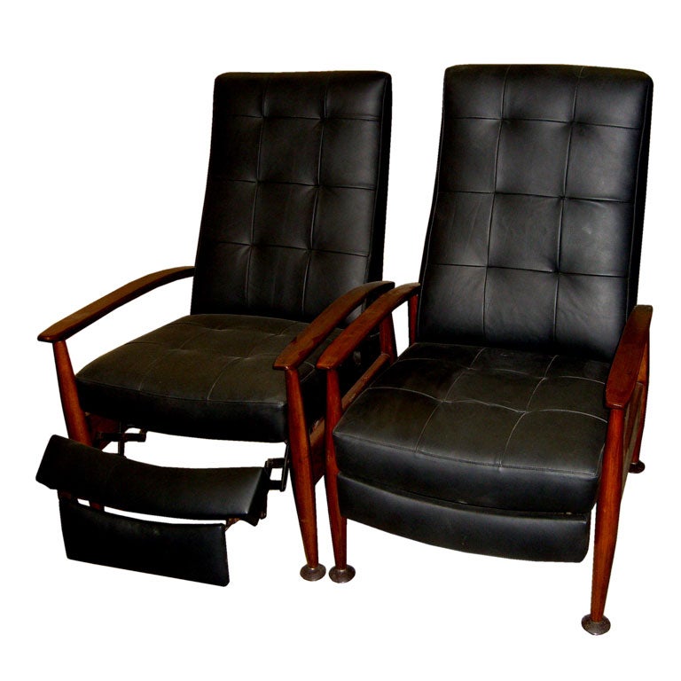 An unusual pair of mid century recliners black leather and walnut at ...