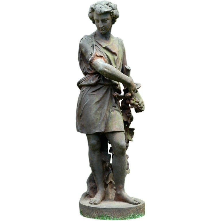 Cast Iron Statue of a Young Boy at 1stDibs