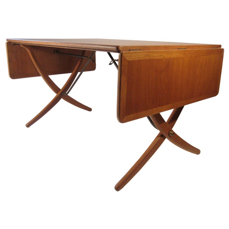 Drop leaf scissor leg table by Hans Wegner at 1stDibs