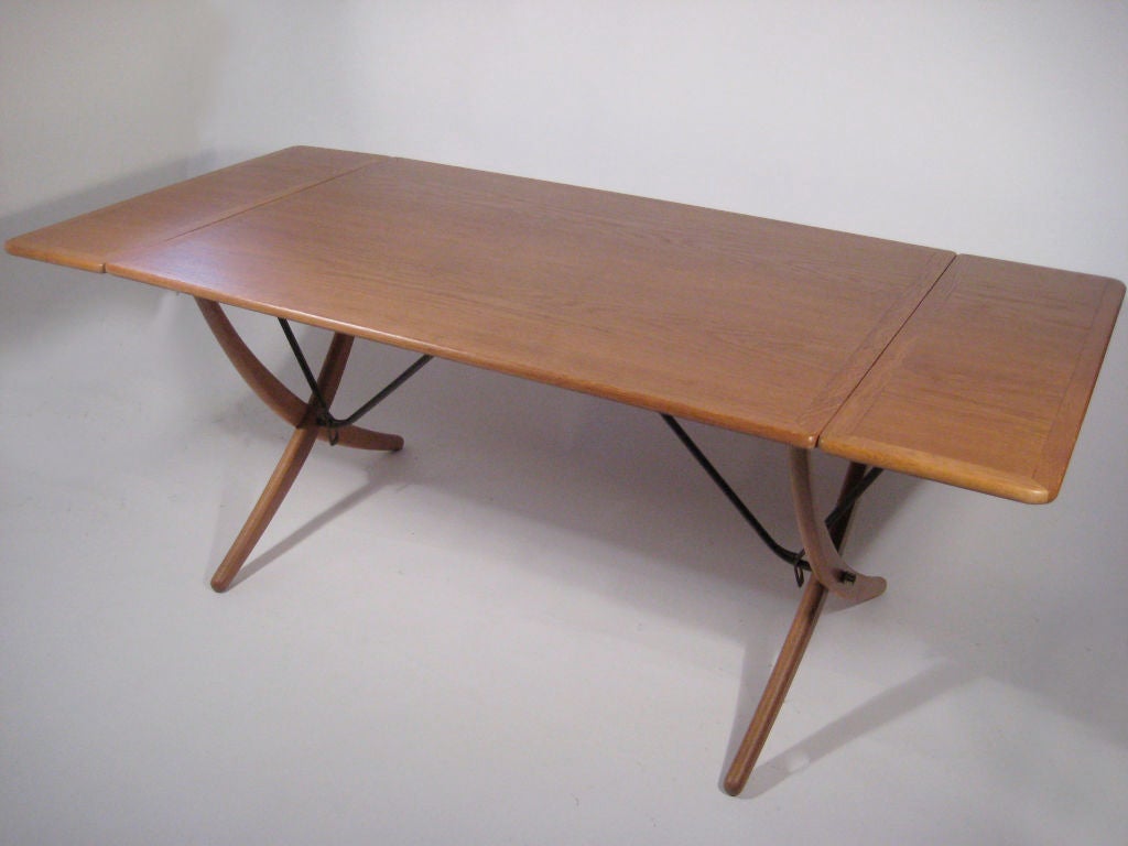 Drop leaf scissor leg table by Hans Wegner at 1stDibs