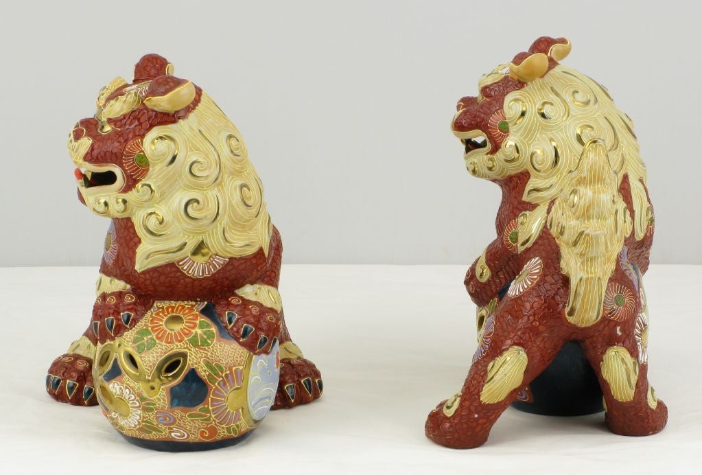 Pair Colorful Porcelain Foo Dogs On Pierced Balls at 1stDibs