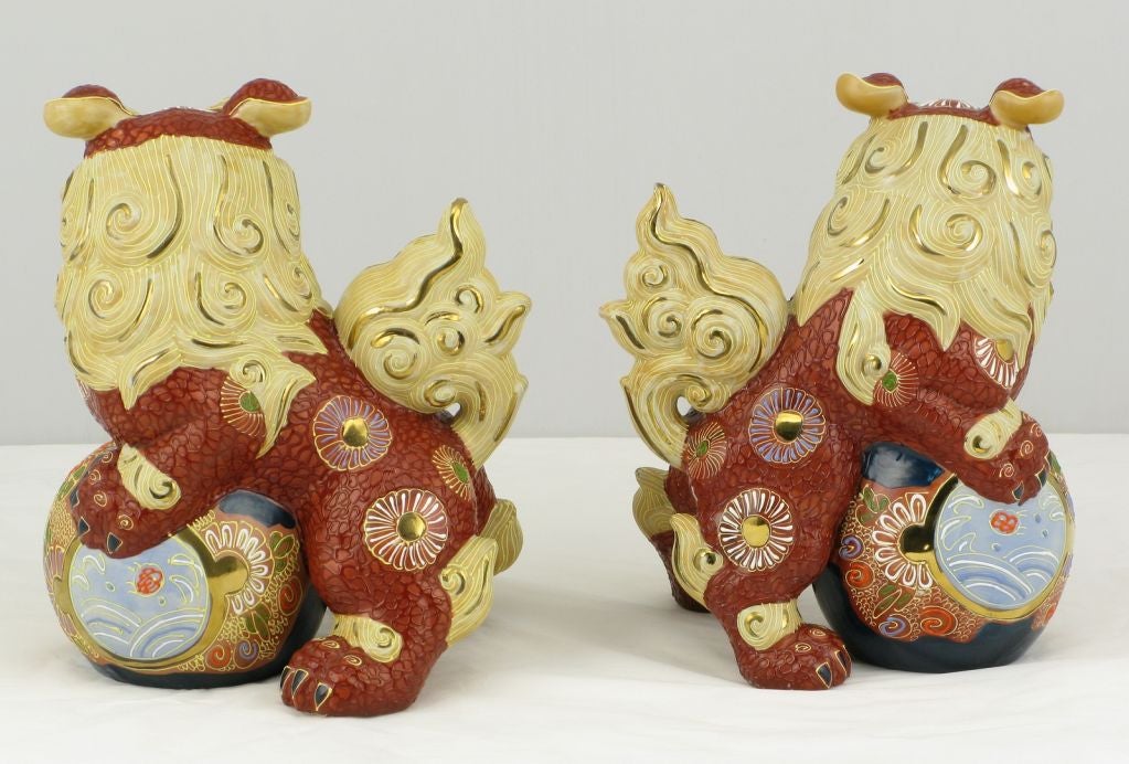 Pair Colorful Porcelain Foo Dogs On Pierced Balls at 1stDibs