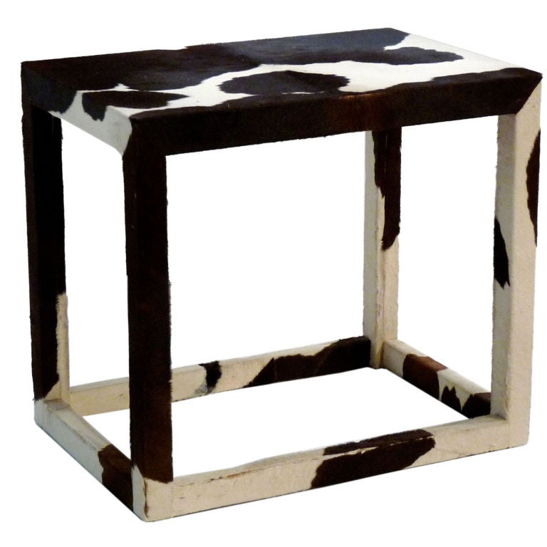 VINTAGE COWHIDE TABLE at 1stDibs