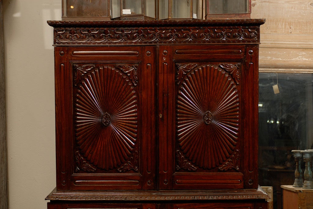 A 19th Century British Colonial Cabinet with Oval Patterns at 1stDibs