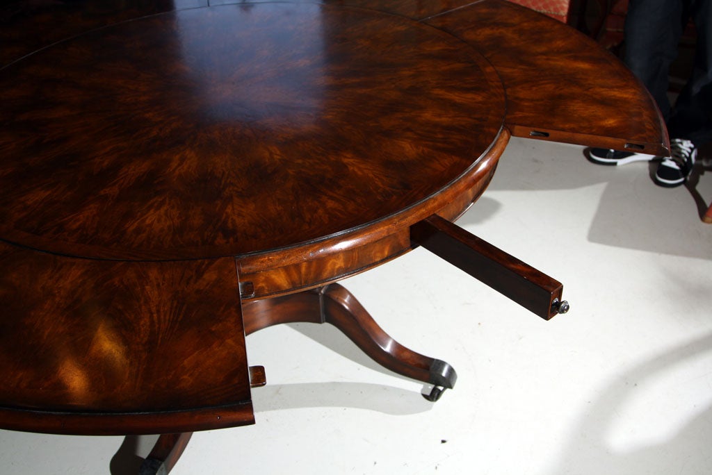 REGENCY CIRCULAR EXTENDING DINING TABLE at 1stDibs