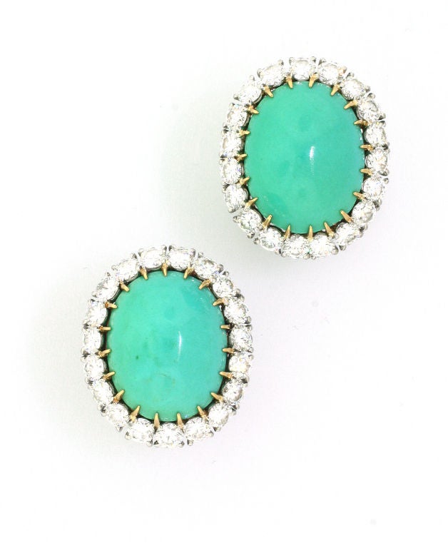 CARTIER. A pair of turquoise and diamond earclips. at 1stDibs
