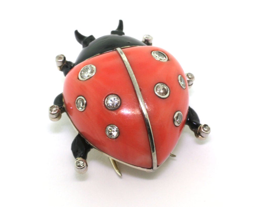 CARTIER. A black lacquer, coral and diamond ladybird brooch. at 1stDibs