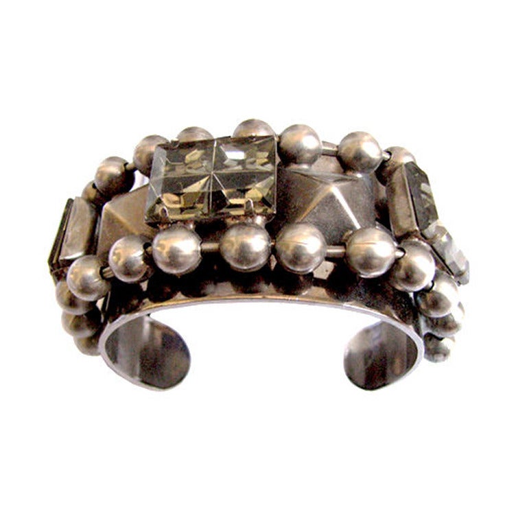THE SHOW MUST GO ON faceted glass and pyramid stud cuff For Sale at 1stDibs