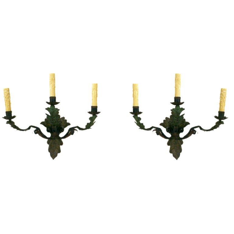 A Painted Pair of Italian Wrought Iron and Metal 3-Arm Appliques at 1stDibs