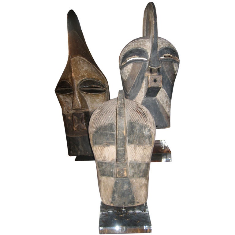 Various Collection of Songye Masks on Stands at 1stDibs