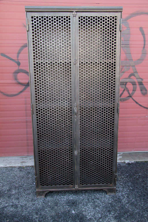 Industrial Perforated Armoire at 1stDibs
