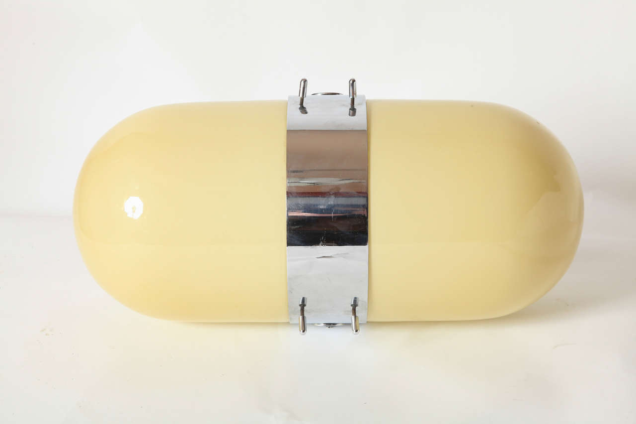 A Pair Of Pill Sconces at 1stDibs