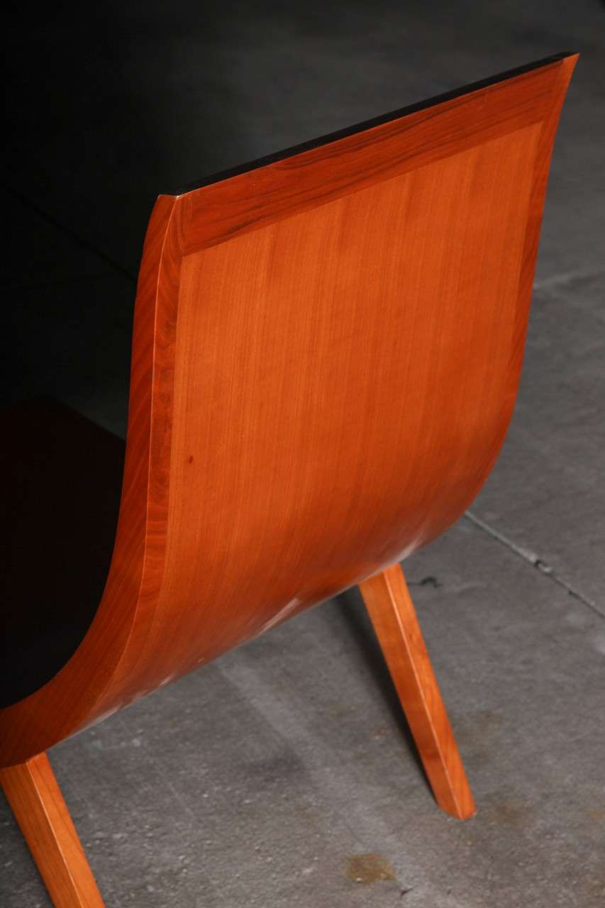 Lounge chair by Richard Peduzzi in molded cherry at 1stDibs