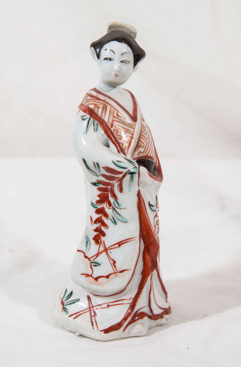 A Pair of 18th Century Japanese Figures of a Man and Woman at 1stDibs