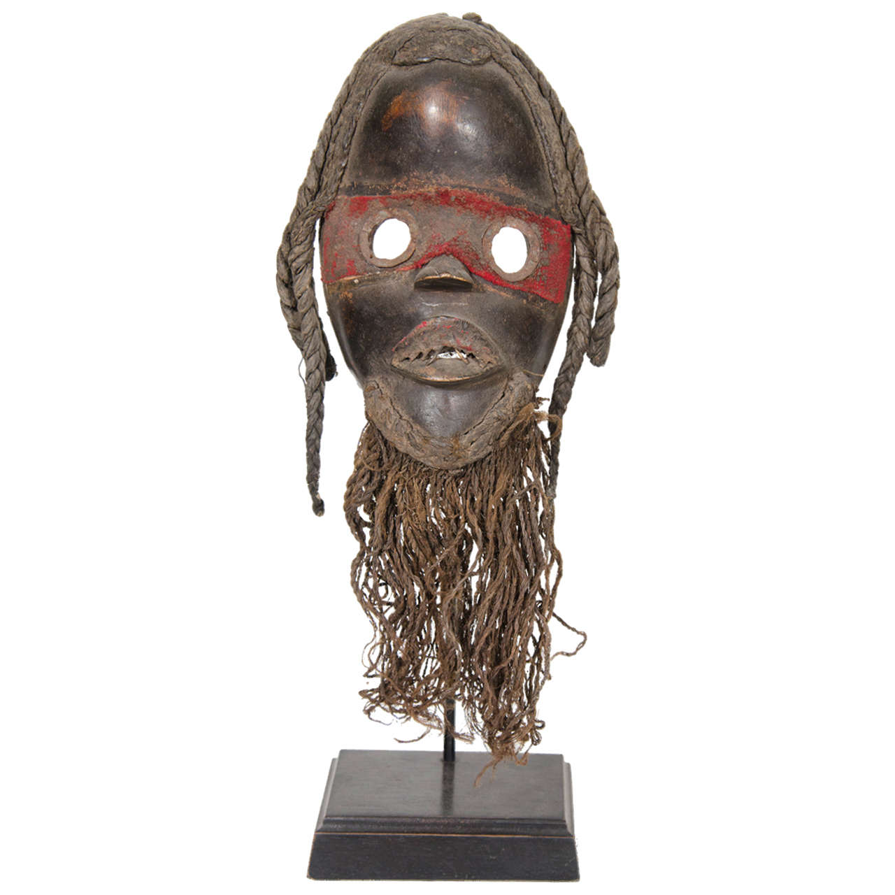 Painted Dan Style Wooden Mask with Decorative Raffia at 1stDibs