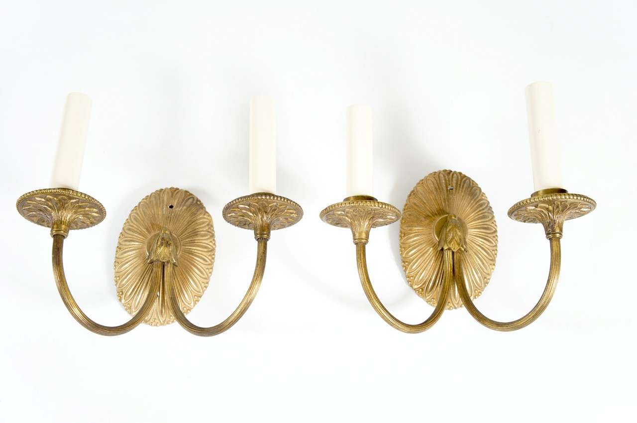Four Neoclassical Gilt-Metal Sconces at 1stDibs